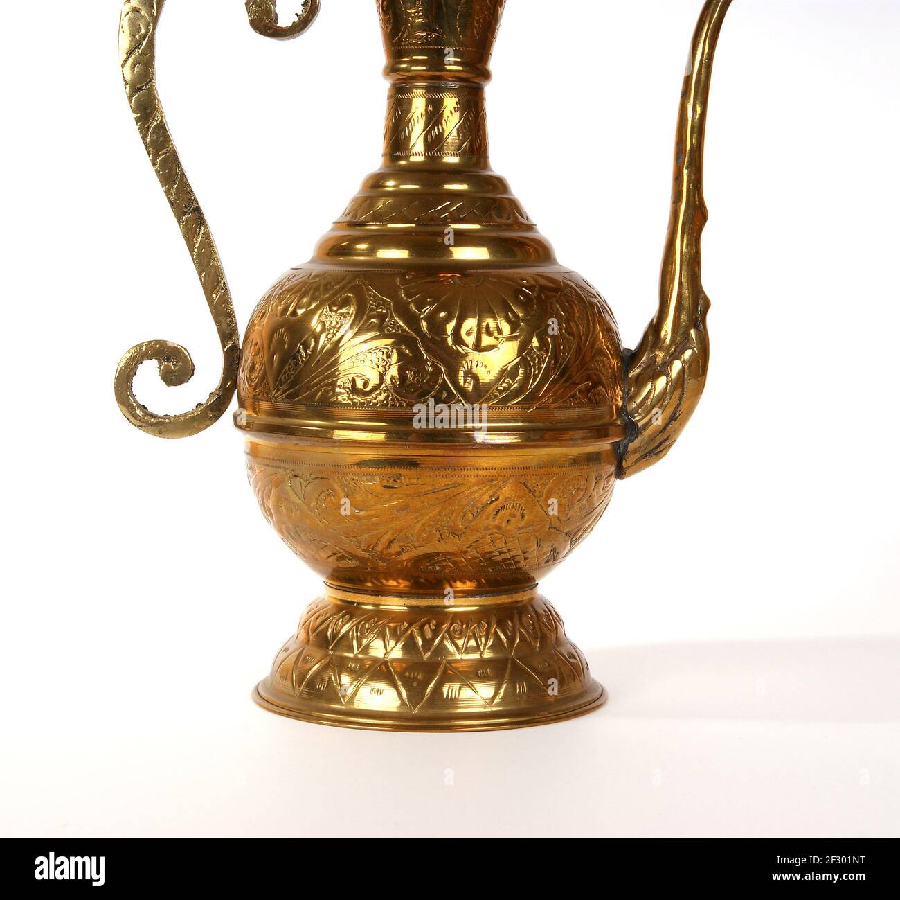 Copper jug with a traditional Arabic ornaments on a white background ...