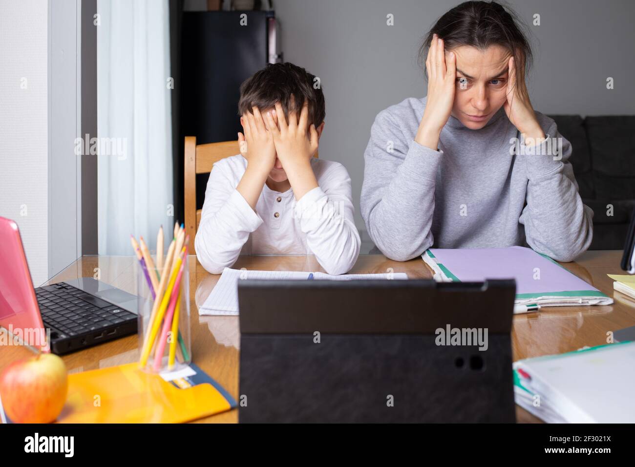 tierd boring boy dont want do homework, child cries Stock Photo - Alamy