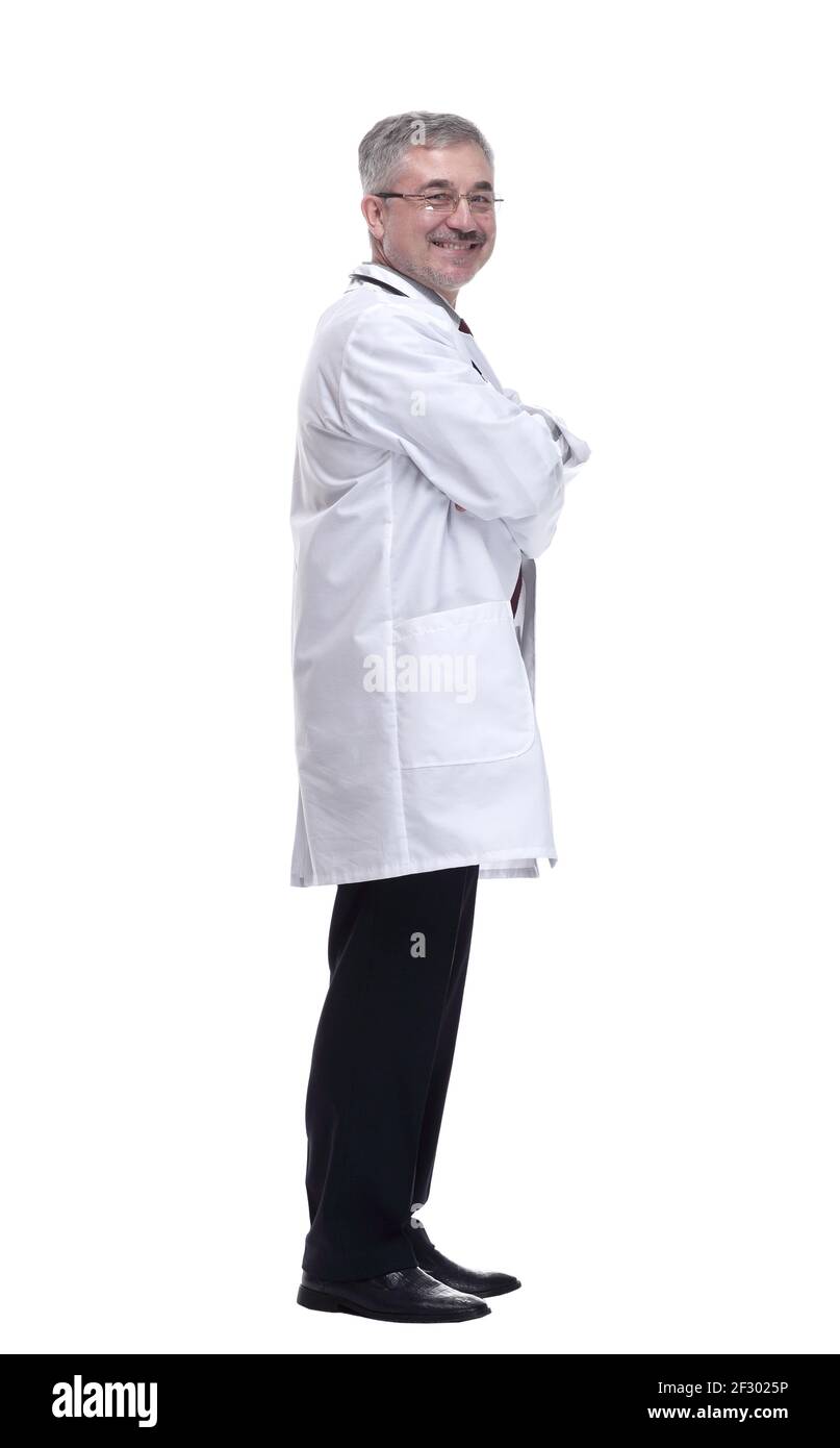 side view. a smiling doctor reading an ad on a white wall Stock Photo ...