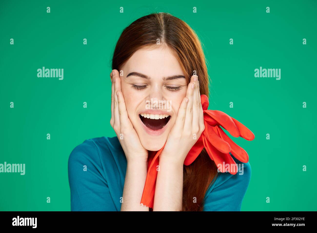 pretty woman cleaning emotions rubber gloves surprised look Green ...
