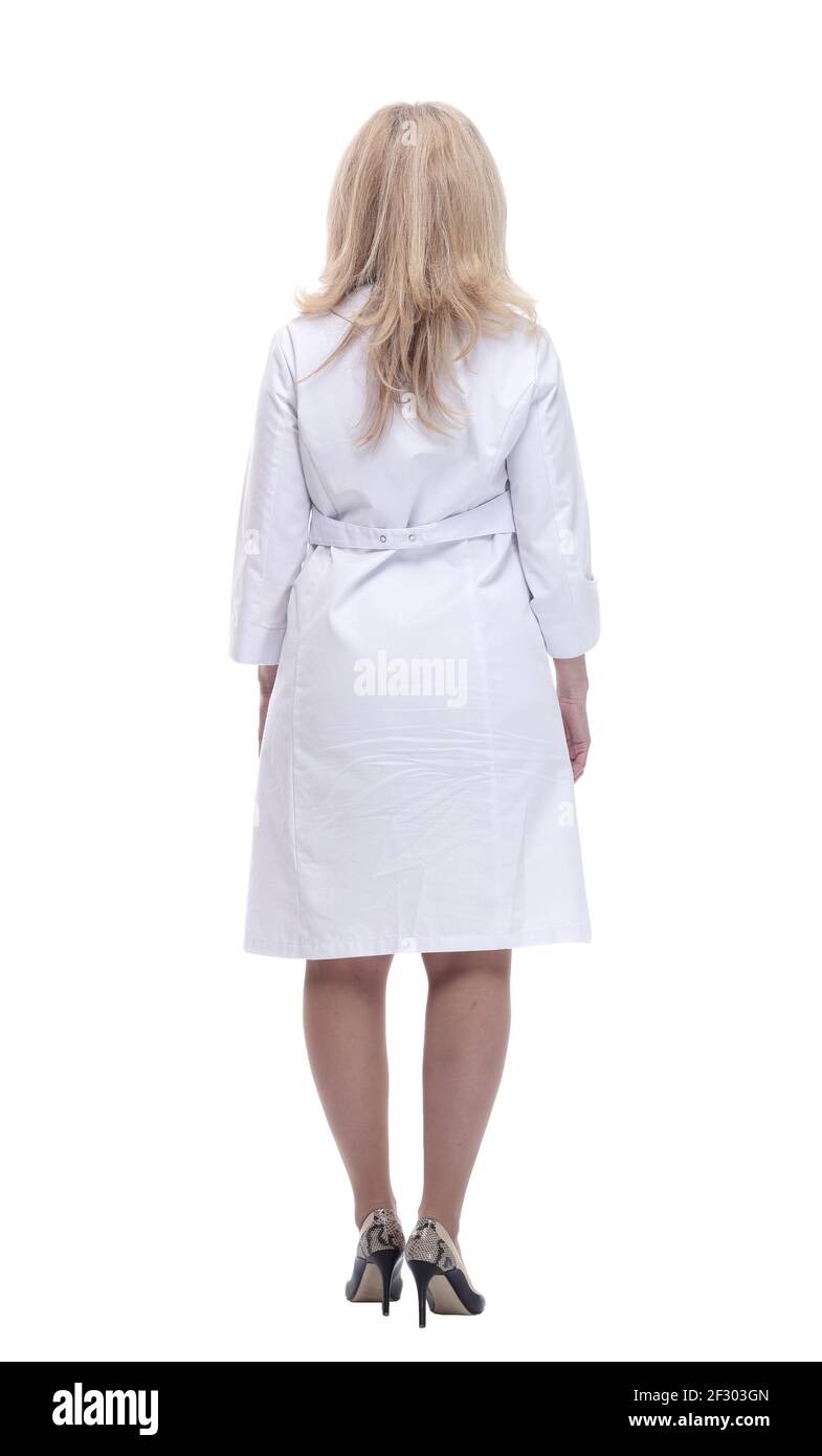 rear view. a woman doctor standing in front of a white wall Stock Photo ...