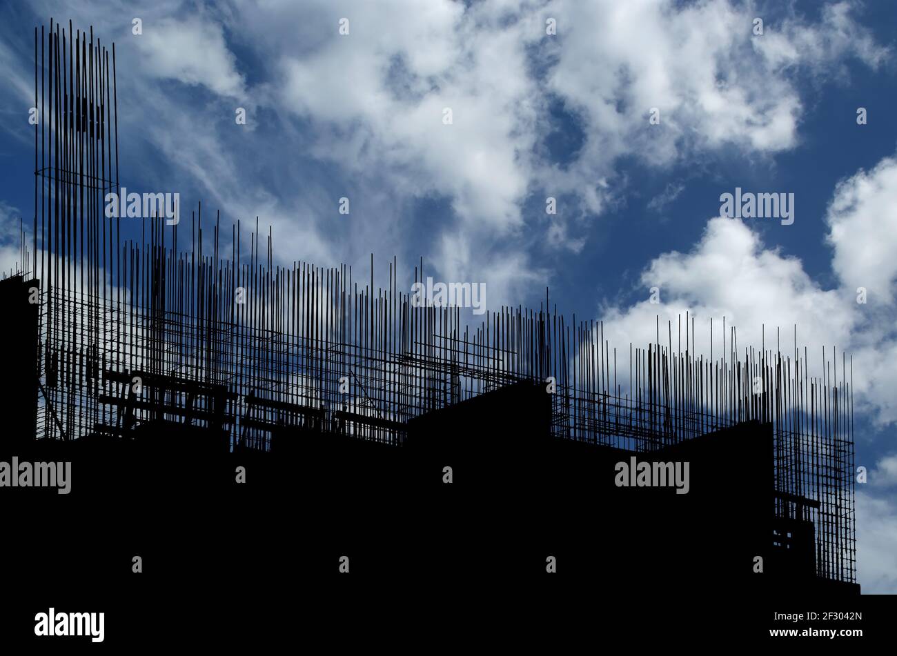 construction equipment and elements of a building under construction ...