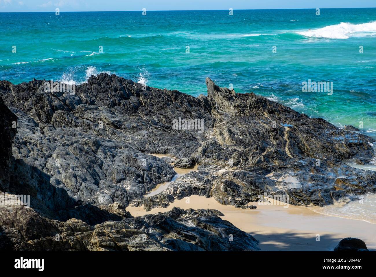 Dangerous coastal rocks Stock Photo - Alamy