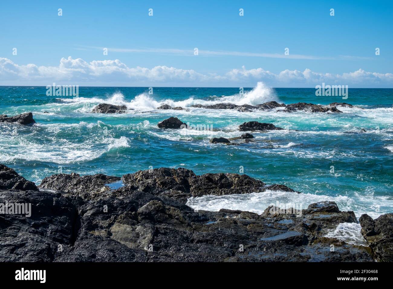 Dangerous coastal rocks Stock Photo - Alamy