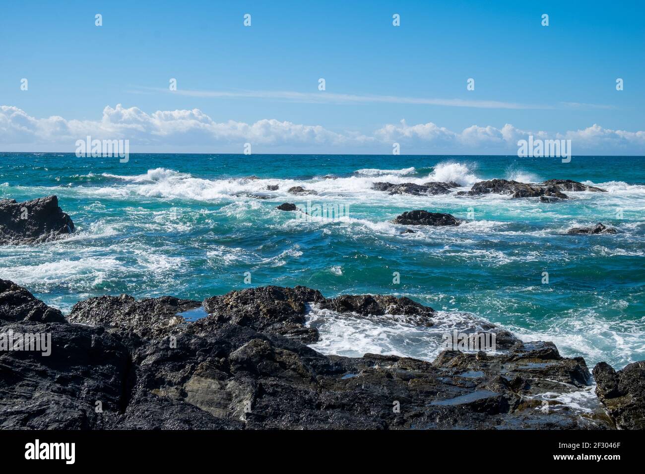 Dangerous coastal rocks Stock Photo - Alamy