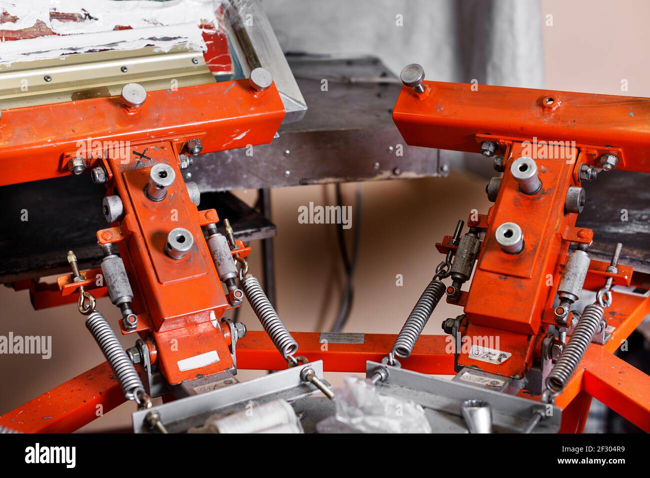 Print screening apparatus. serigraphy production. printing images on t ...