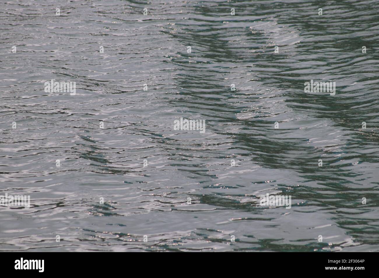 Sea water in harbour in close up Stock Photo - Alamy