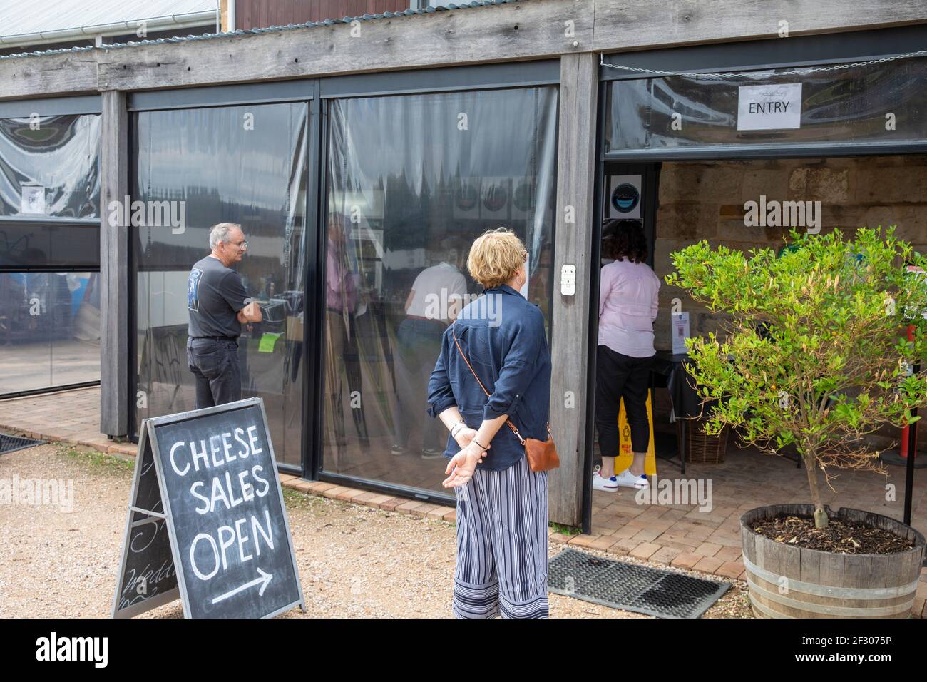 Cheese tasting in Mudgee, woman maintains social distance during covid ...