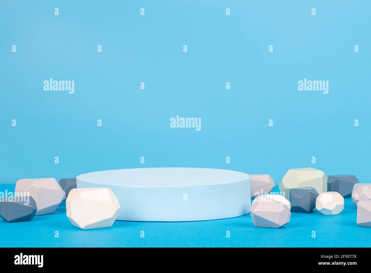 Abstract cylinder platform podium with geometric form on light blue ...