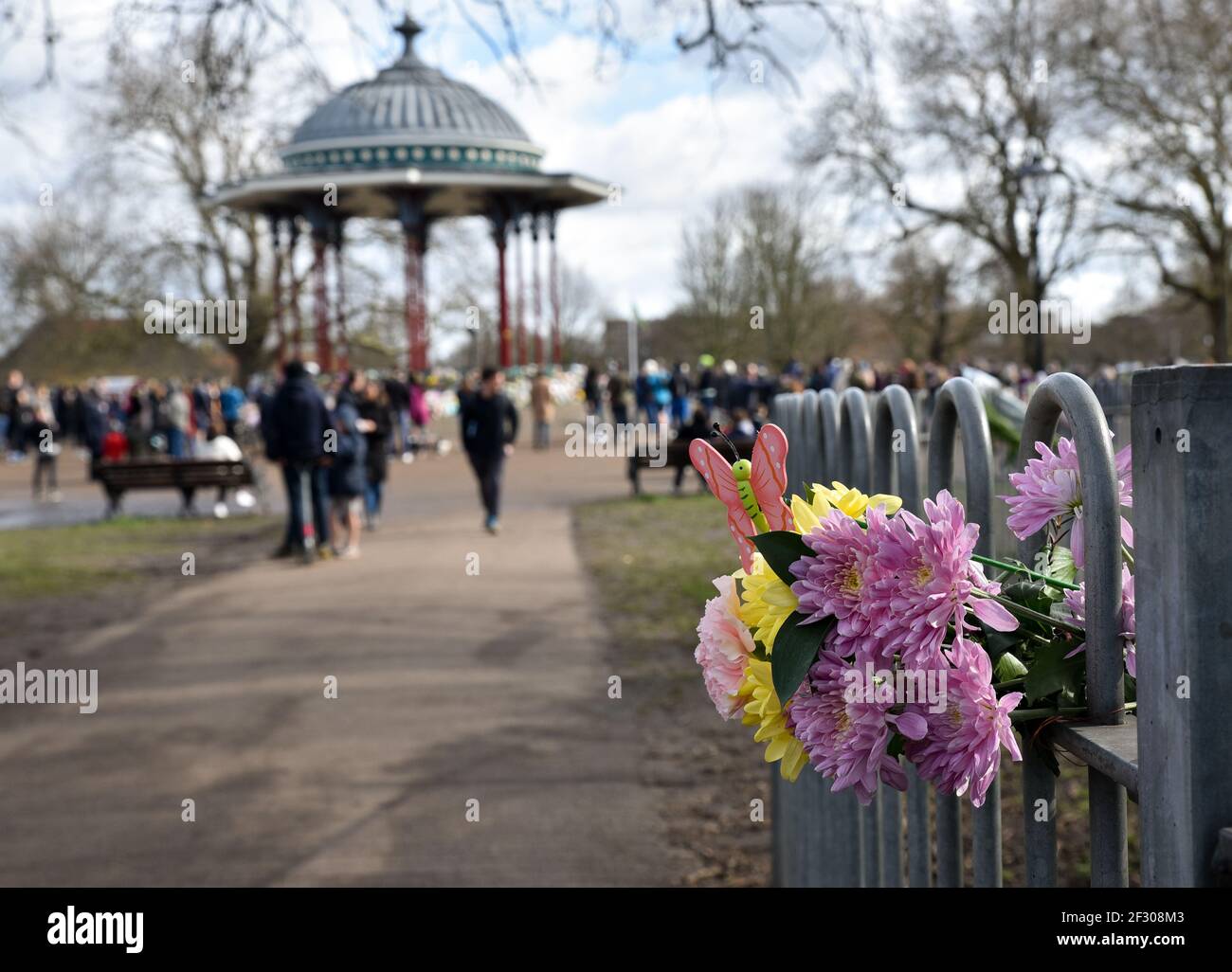 Clapham Common, London, UK. 14th Mar 2021. People paying their respects ...