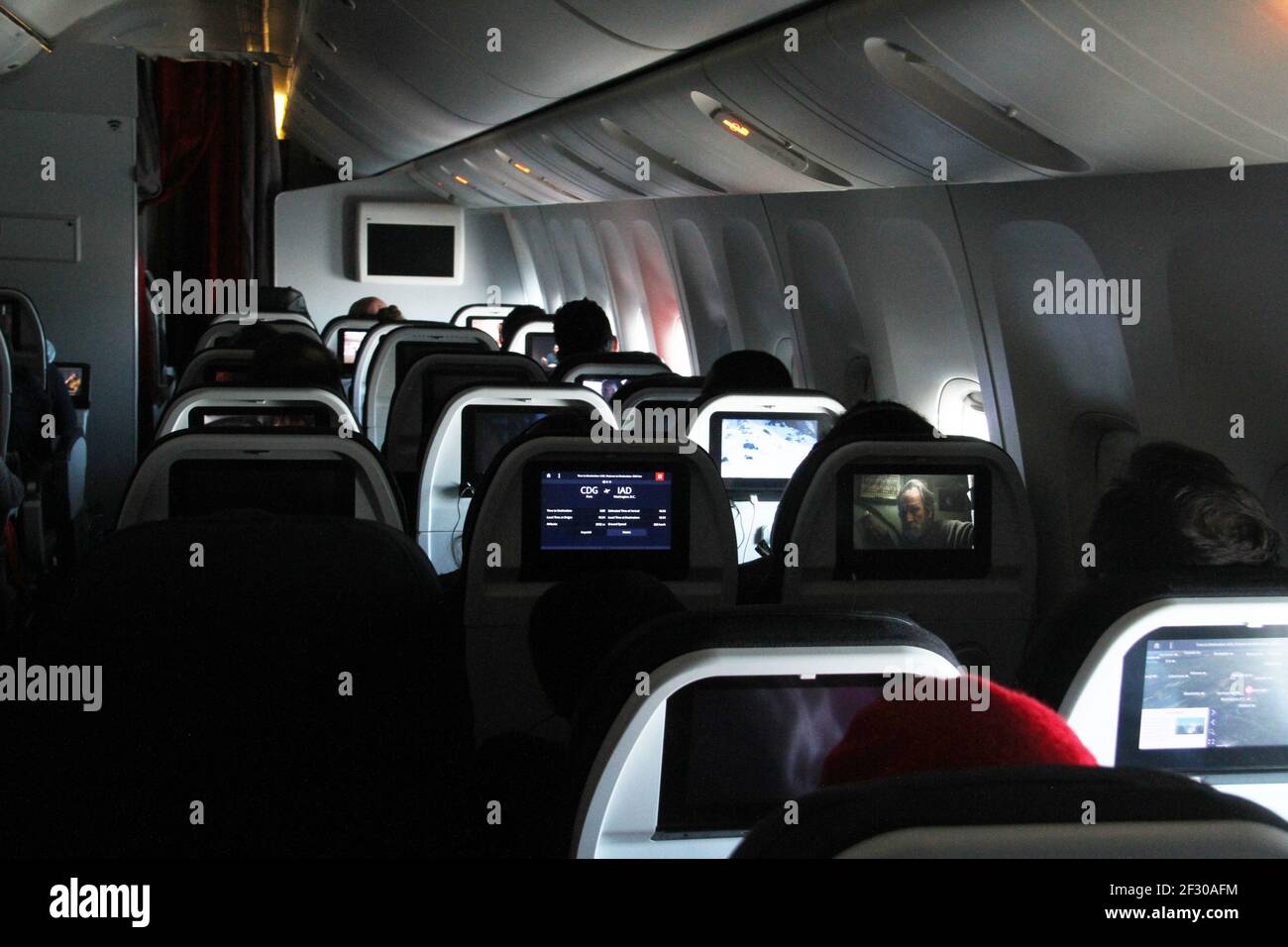 Inside an airplane during a long flight Stock Photo - Alamy