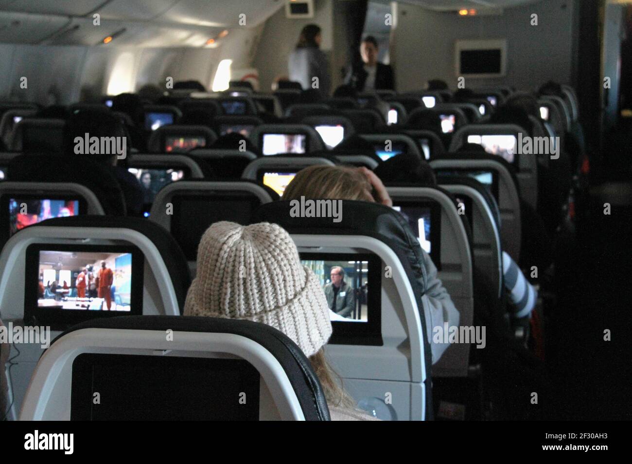 Inside an airplane during a long flight Stock Photo - Alamy