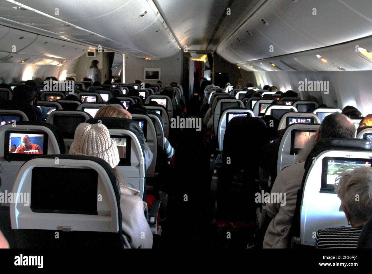 Inside an airplane during a long flight Stock Photo - Alamy