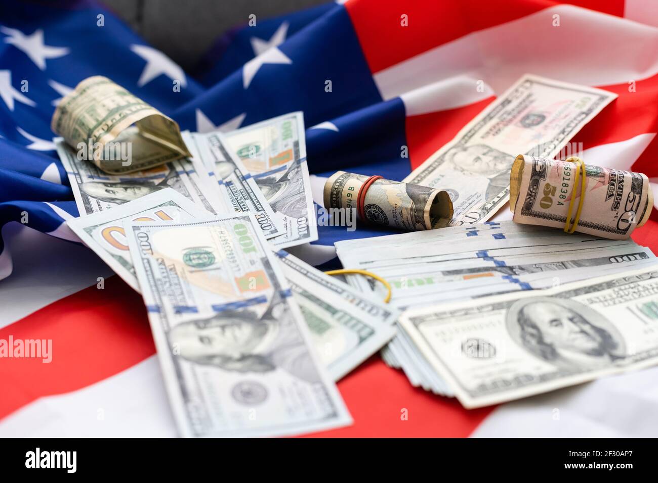 American flag on assorted banknotes, dollars Stock Photo - Alamy