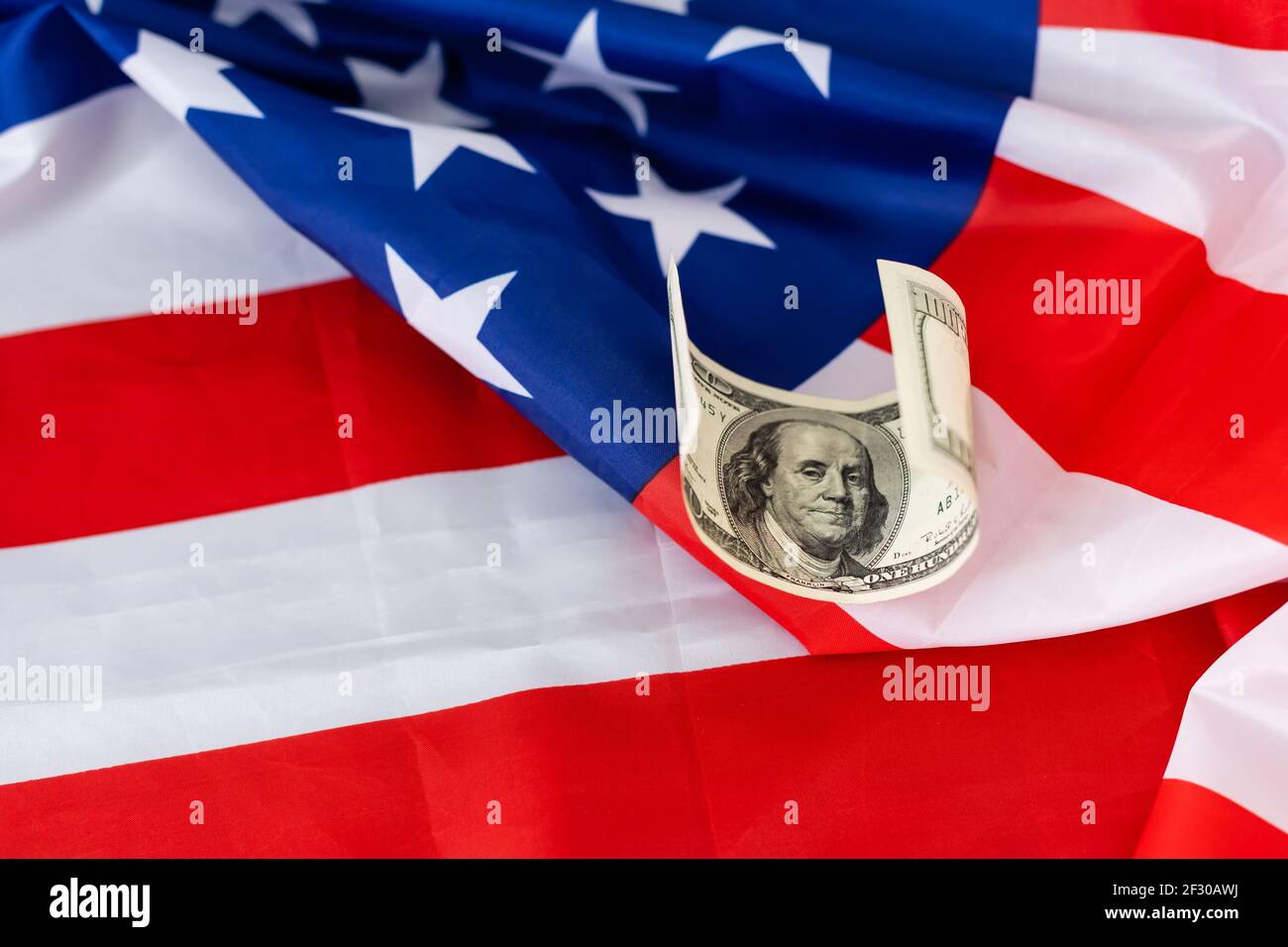 American flag on assorted banknotes, dollars Stock Photo - Alamy