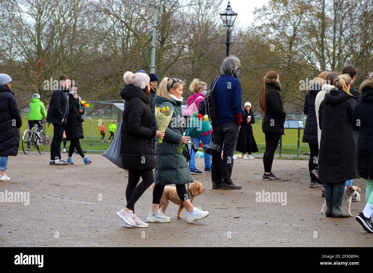 London, UK. 14th Mar, 2021. Tributes to Sarah Everard at Clapham Common ...
