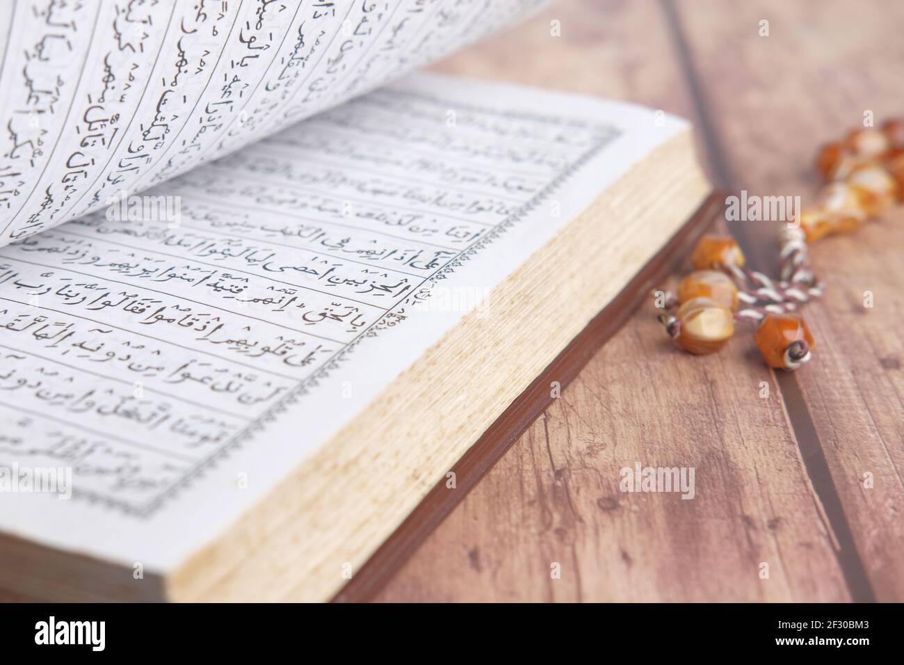Qu'ran text close up hi-res stock photography and images - Alamy