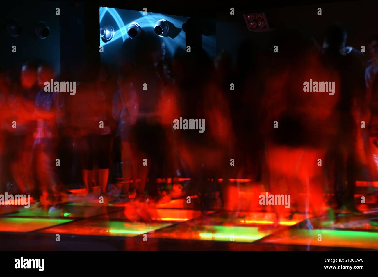 Nightclub dance crowd in motion Stock Photo - Alamy
