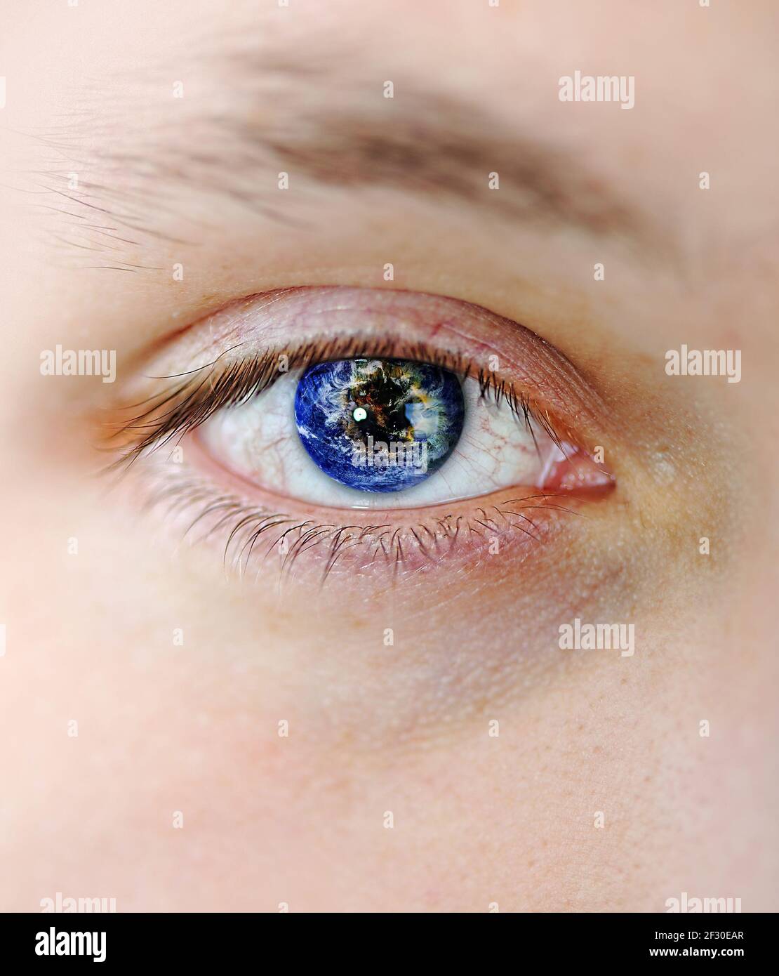 Eye on the world - world in the eye Stock Photo - Alamy