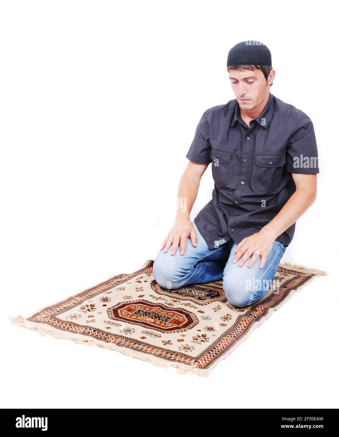 Muslim man praying Cut Out Stock Images & Pictures - Alamy