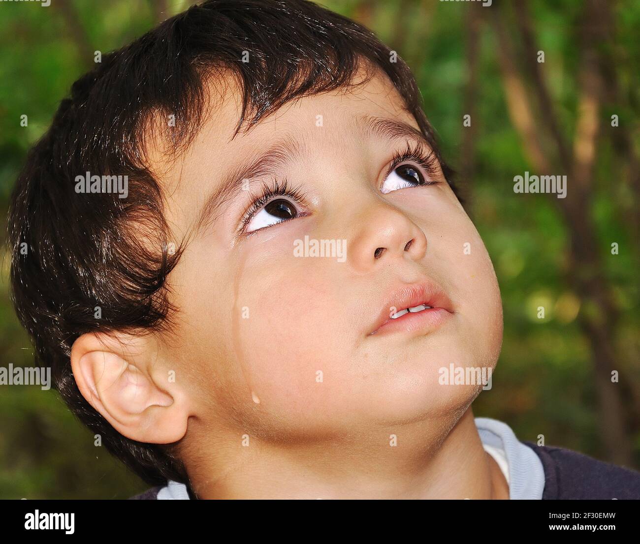 Very cute kid crying with true emotional tears Stock Photo - Alamy