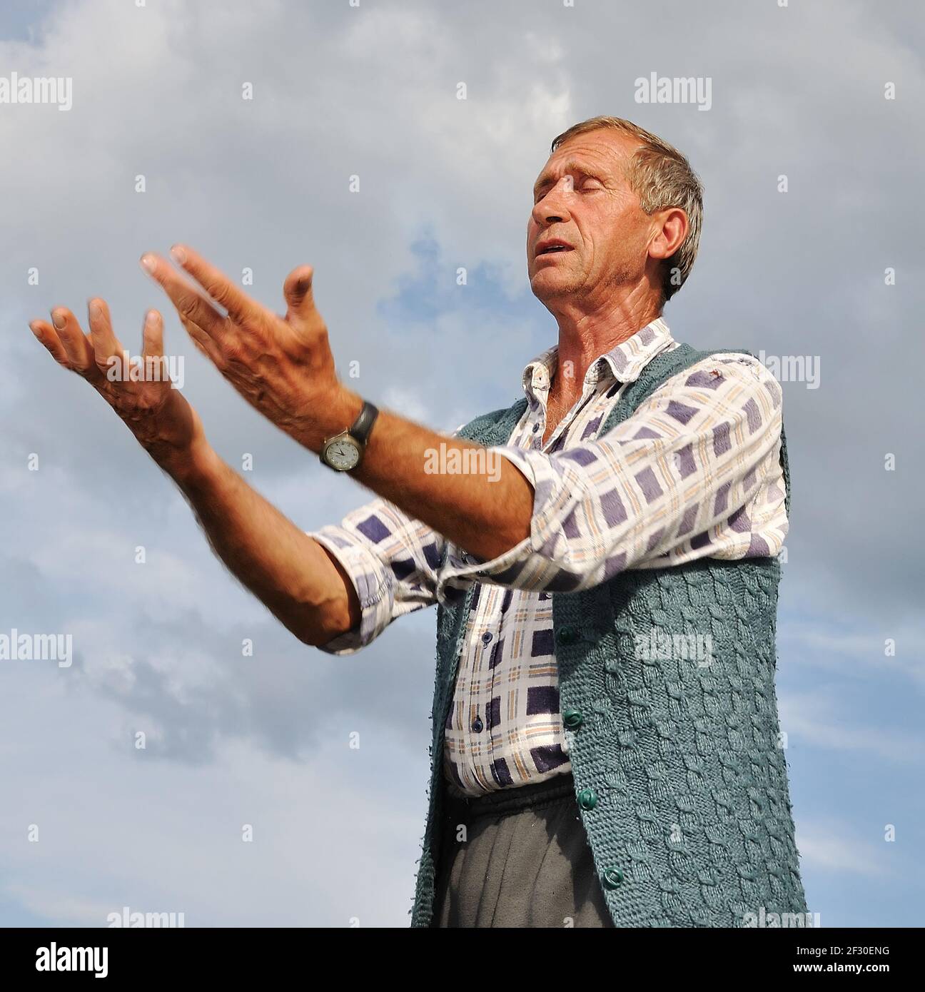 Middle aged male person with interesting gestures Stock Photo - Alamy