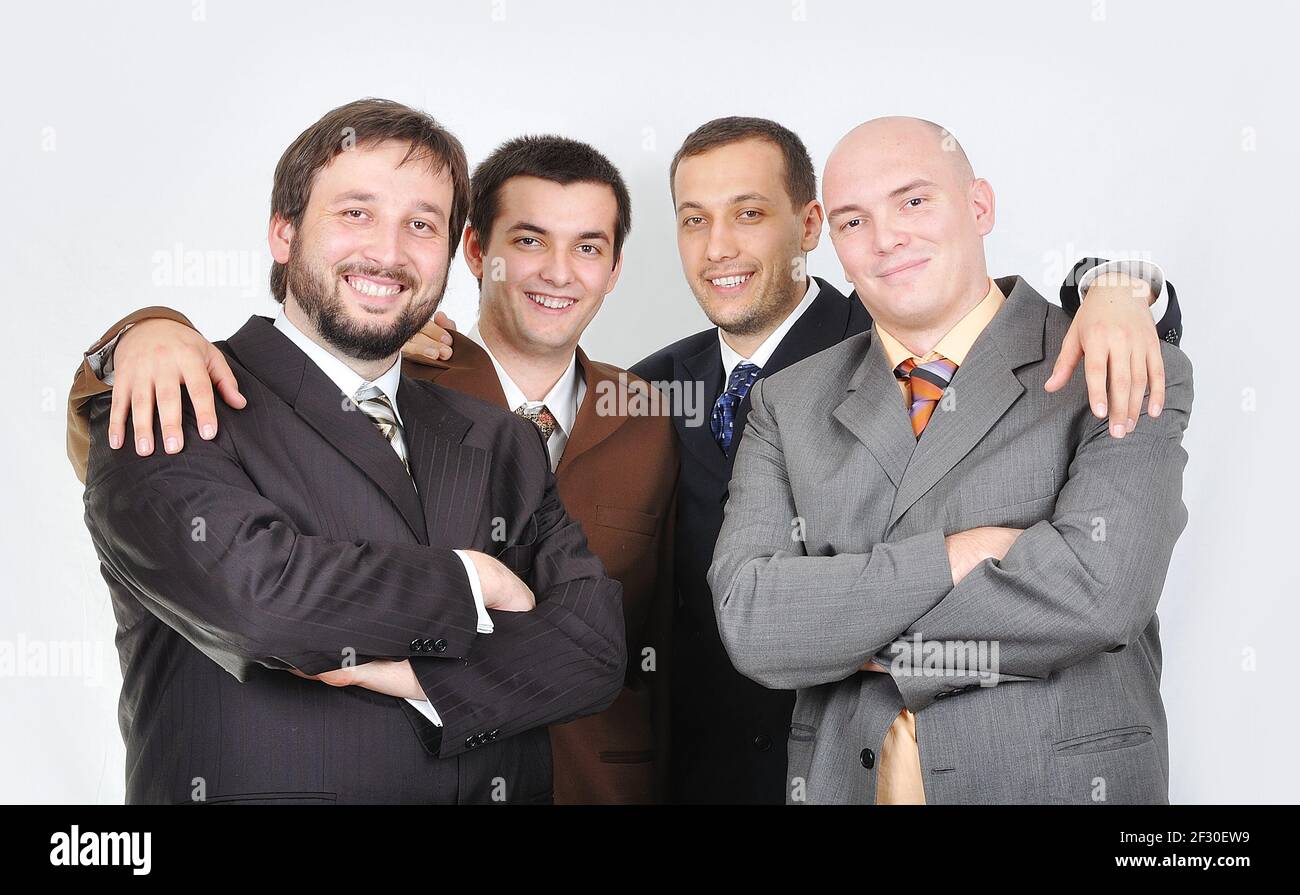Group of young businessmen together on light background Stock Photo - Alamy