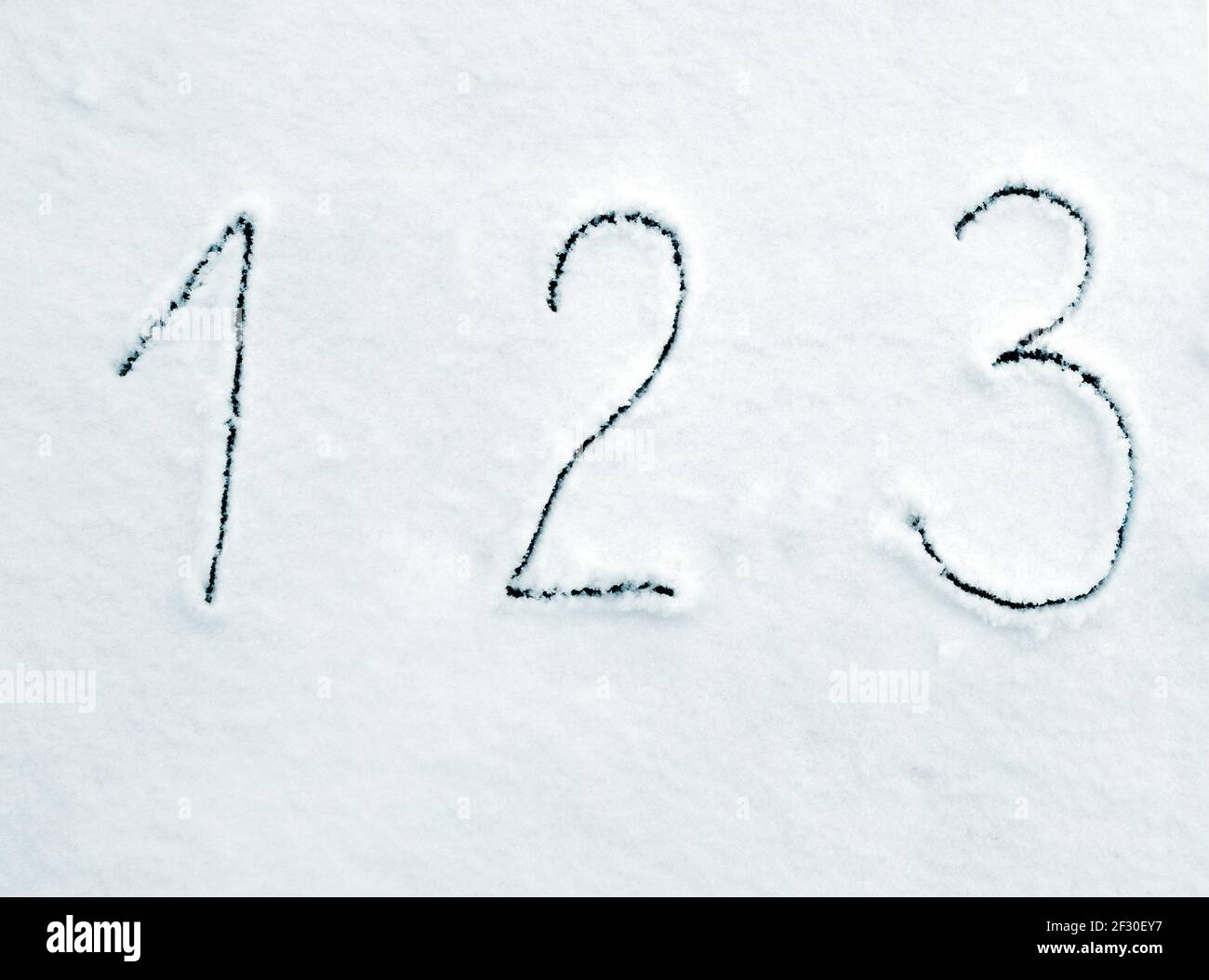 Snow numbers handwriting font Stock Photo - Alamy