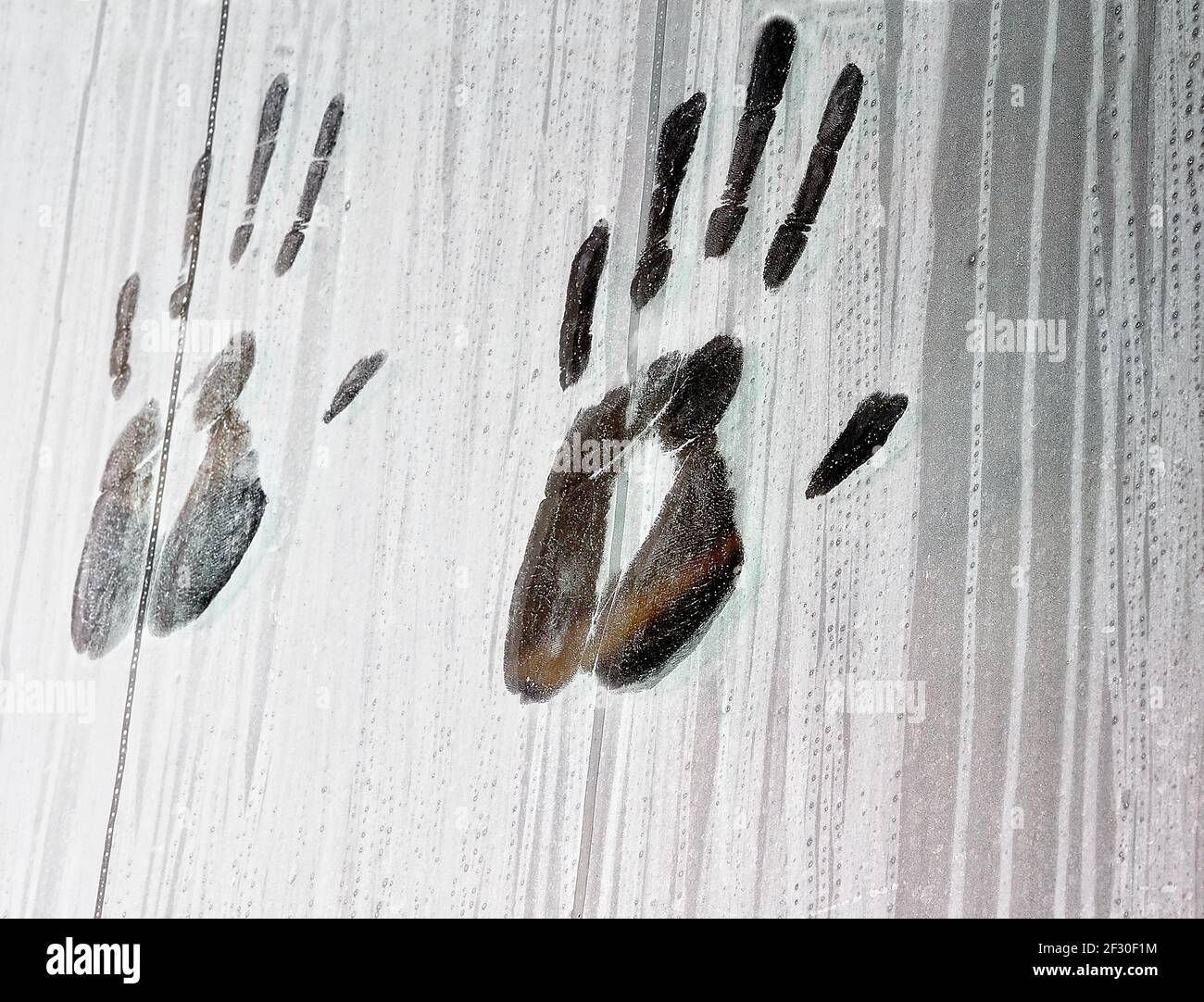 Handprints on the glass Stock Photo - Alamy