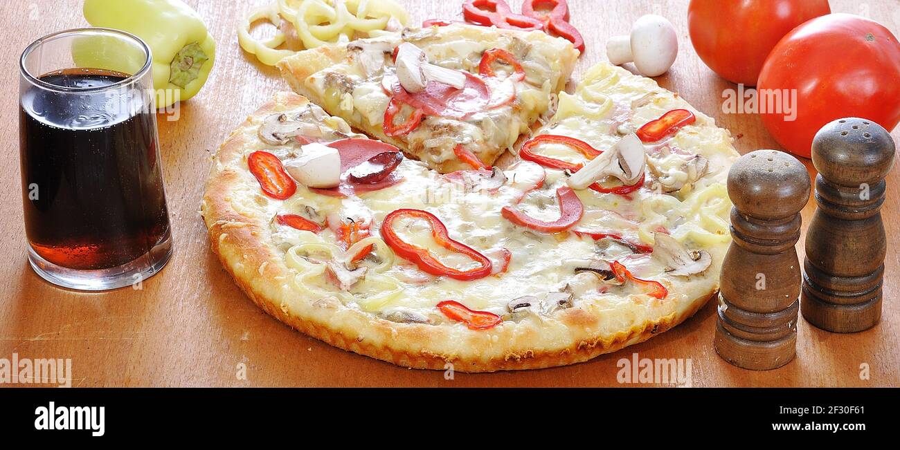 Italian pizza with many colors and ingredients Stock Photo - Alamy