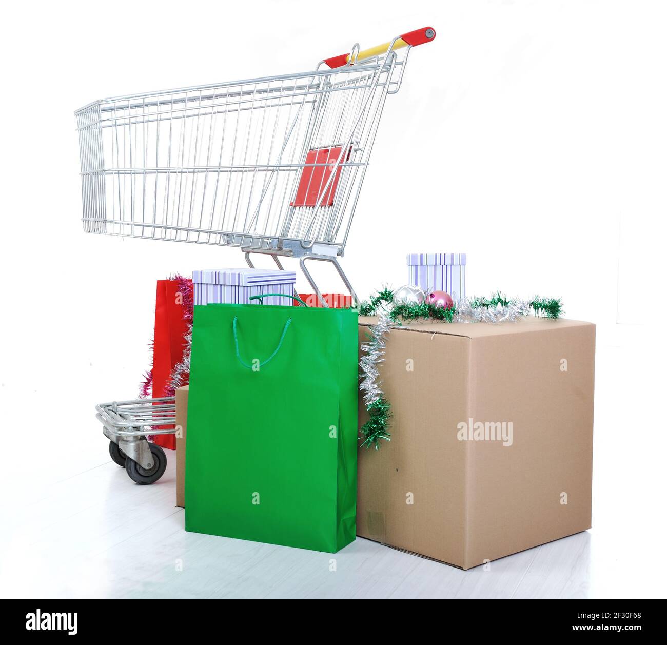 Shopping cart with boxes and bags Stock Photo - Alamy