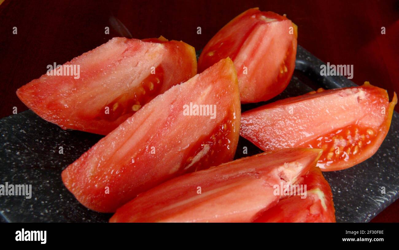 Tomatoe pieces hi-res stock photography and images - Alamy