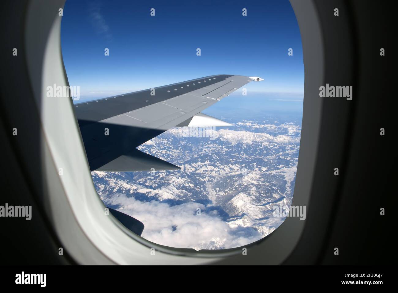 Aircraft illuminator window view Stock Photo - Alamy
