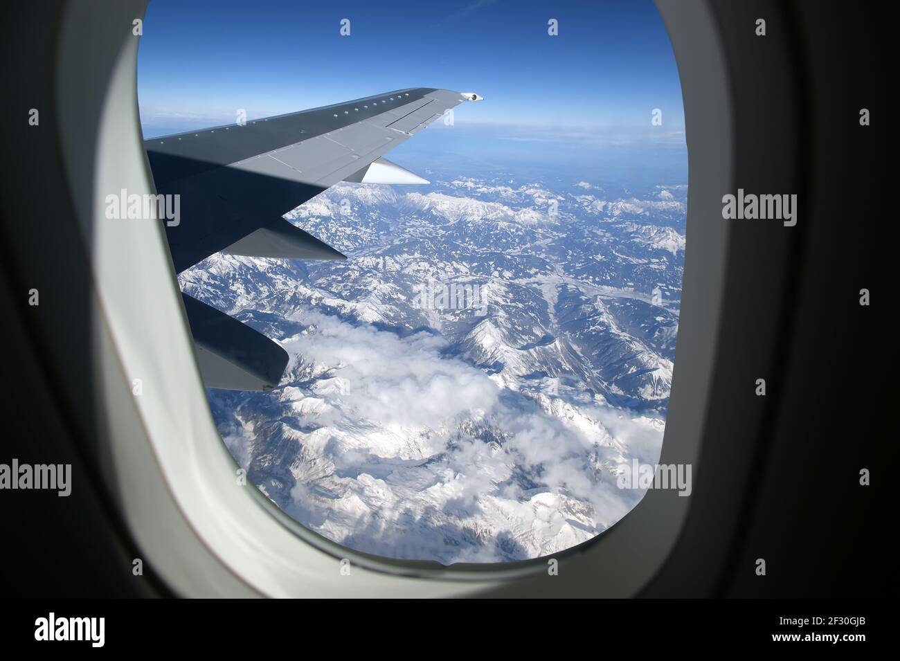Aircraft illuminator window view Stock Photo - Alamy