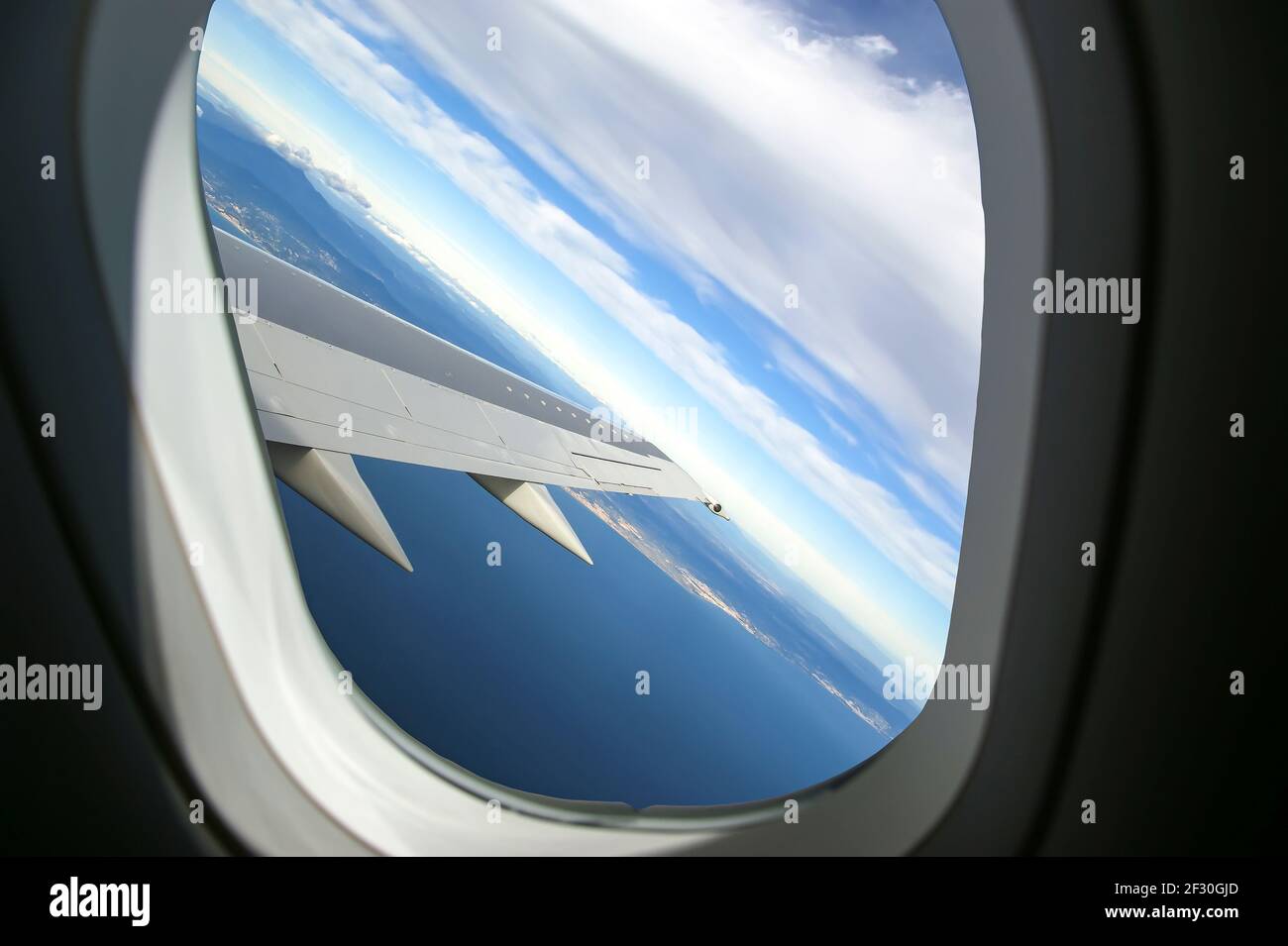 Aircraft illuminator window view Stock Photo - Alamy