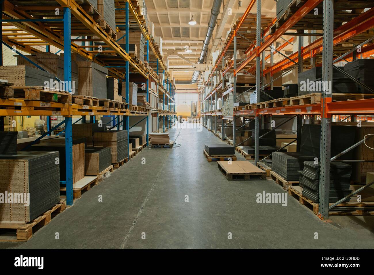 Huge warehouse interior on factory Stock Photo - Alamy