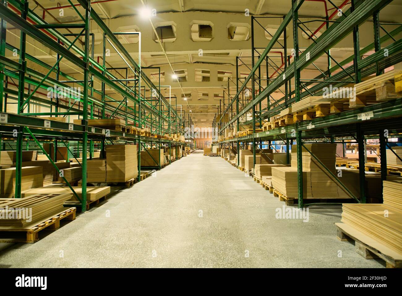 Huge storage warehouse interior on factory Stock Photo - Alamy