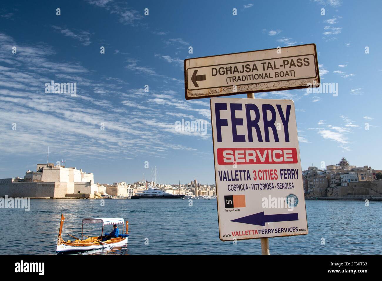Signage for traditional boat and ferry services to the 2 cities ...