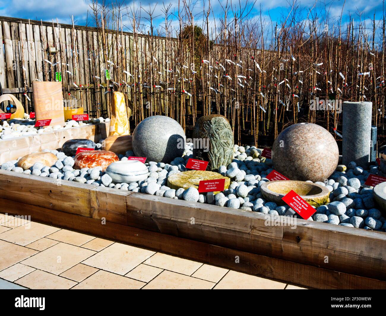 Garden Centre display of rock items such as granite spheres and wheels ...
