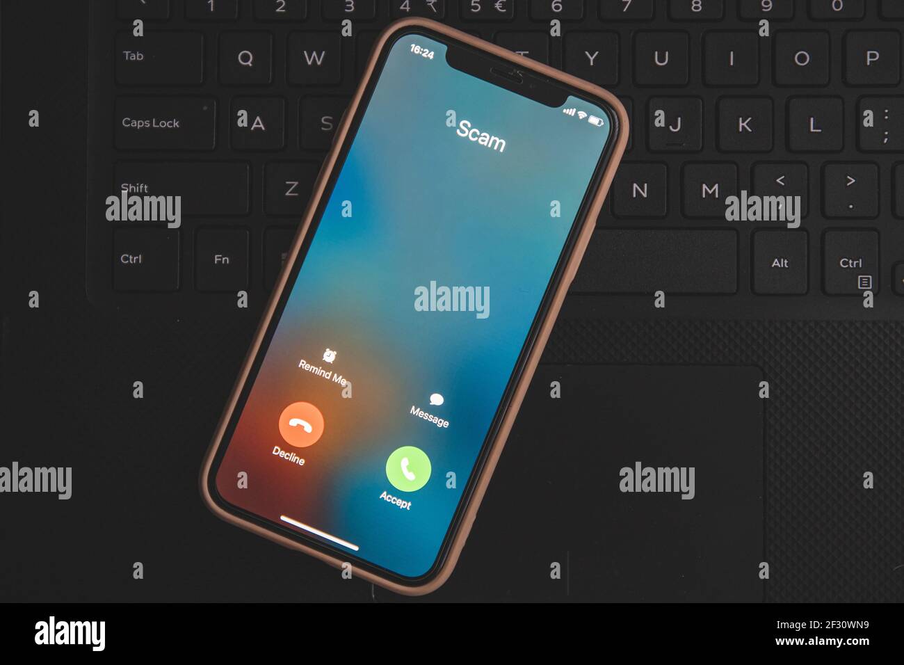 Incoming call from Scammer. Scam on phone and online Stock Photo - Alamy