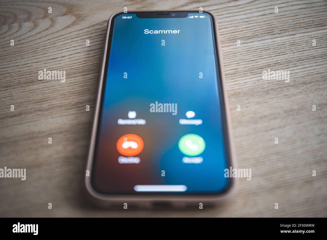 Incoming call from Scammer. Scam on phone and online Stock Photo - Alamy