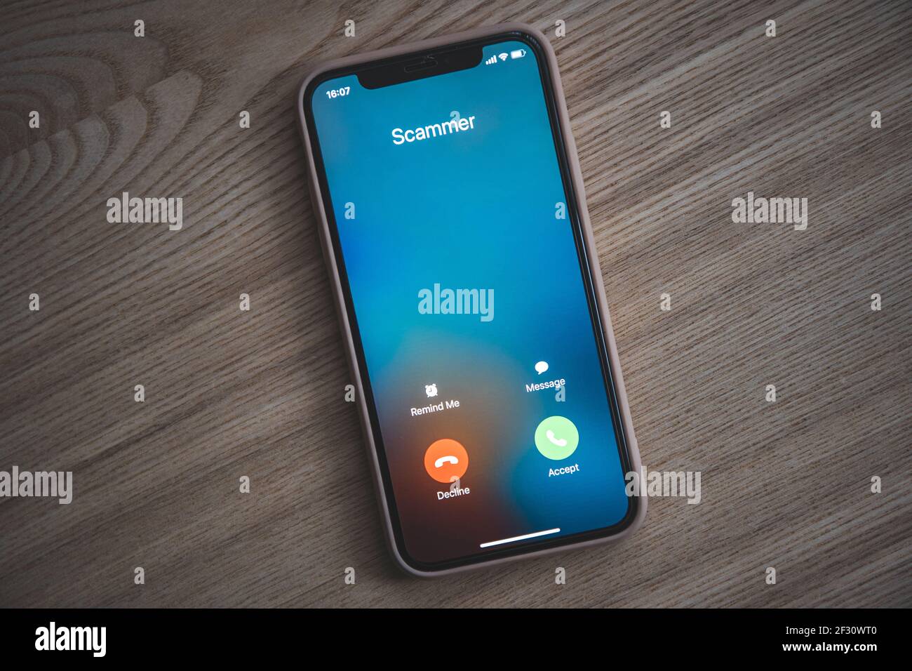 Incoming call from Scammer. Scam on phone and online Stock Photo - Alamy
