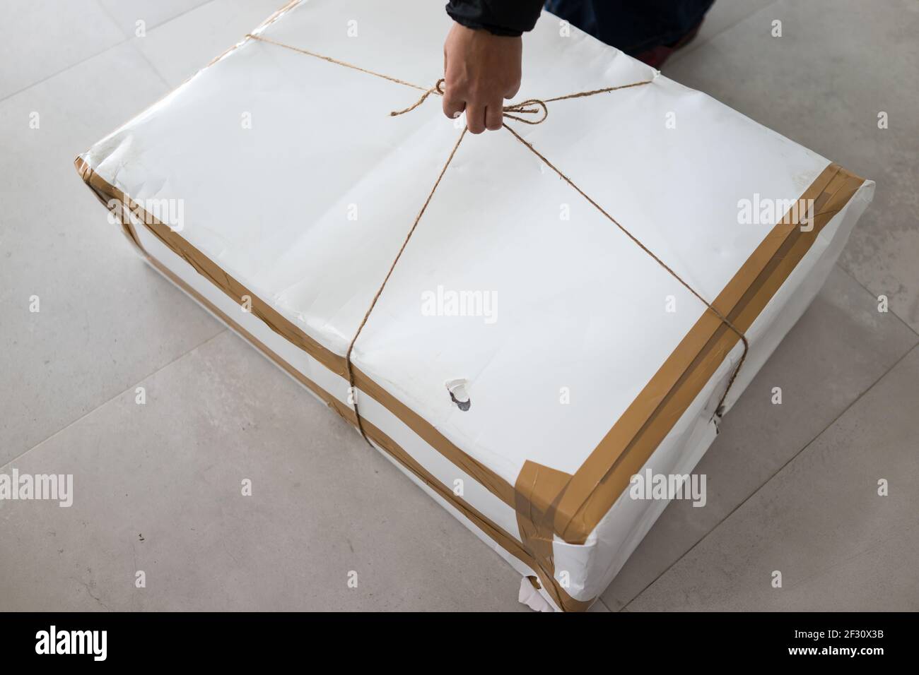 Delivery box arrived Stock Photo - Alamy