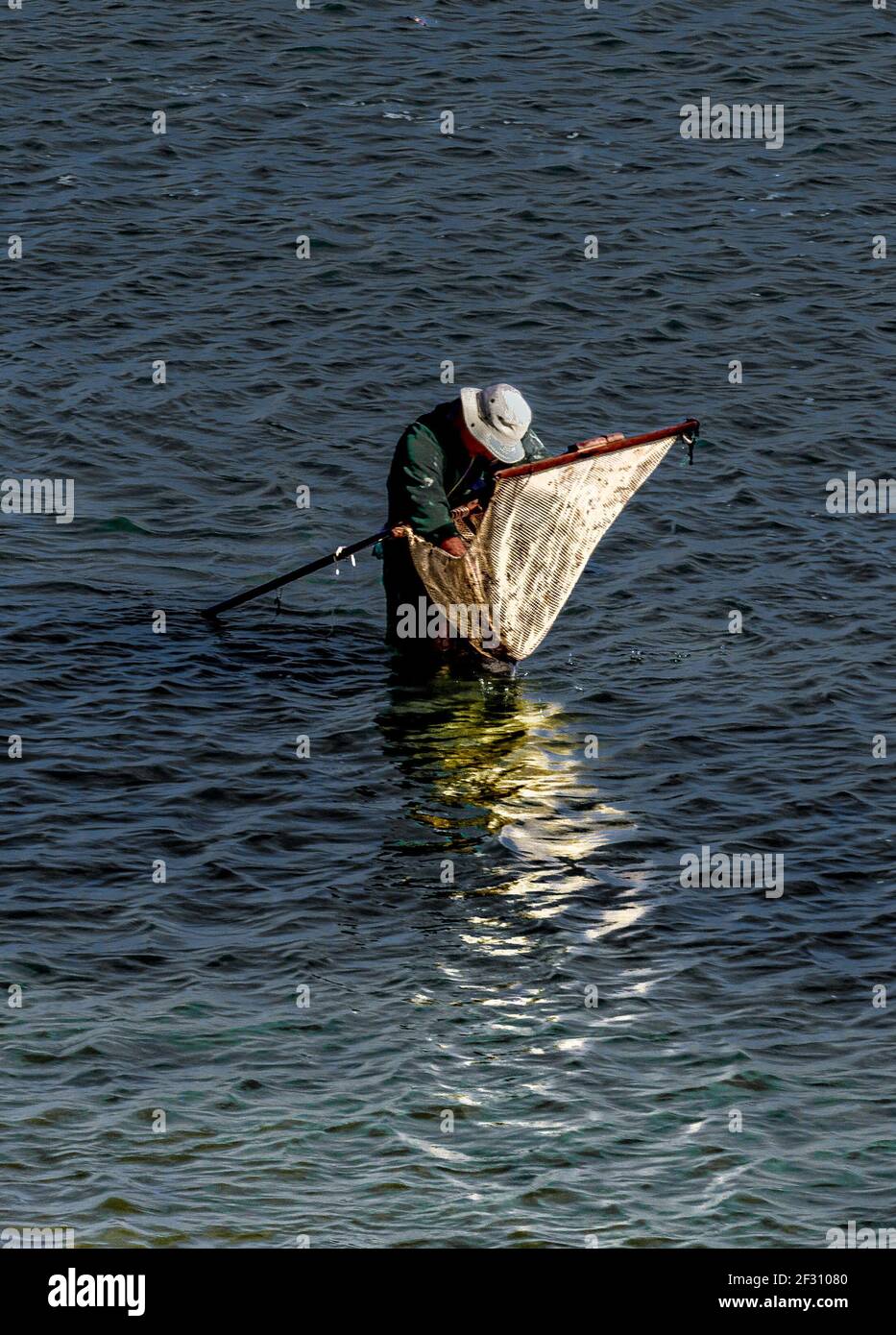 Fishing on foot in Brittany Stock Photo - Alamy