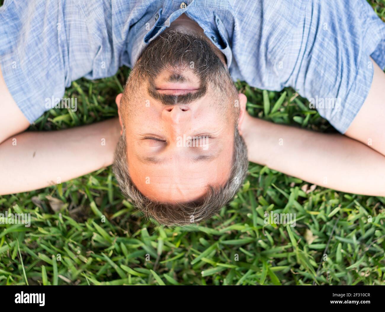 Portrait upside down man hi-res stock photography and images - Alamy