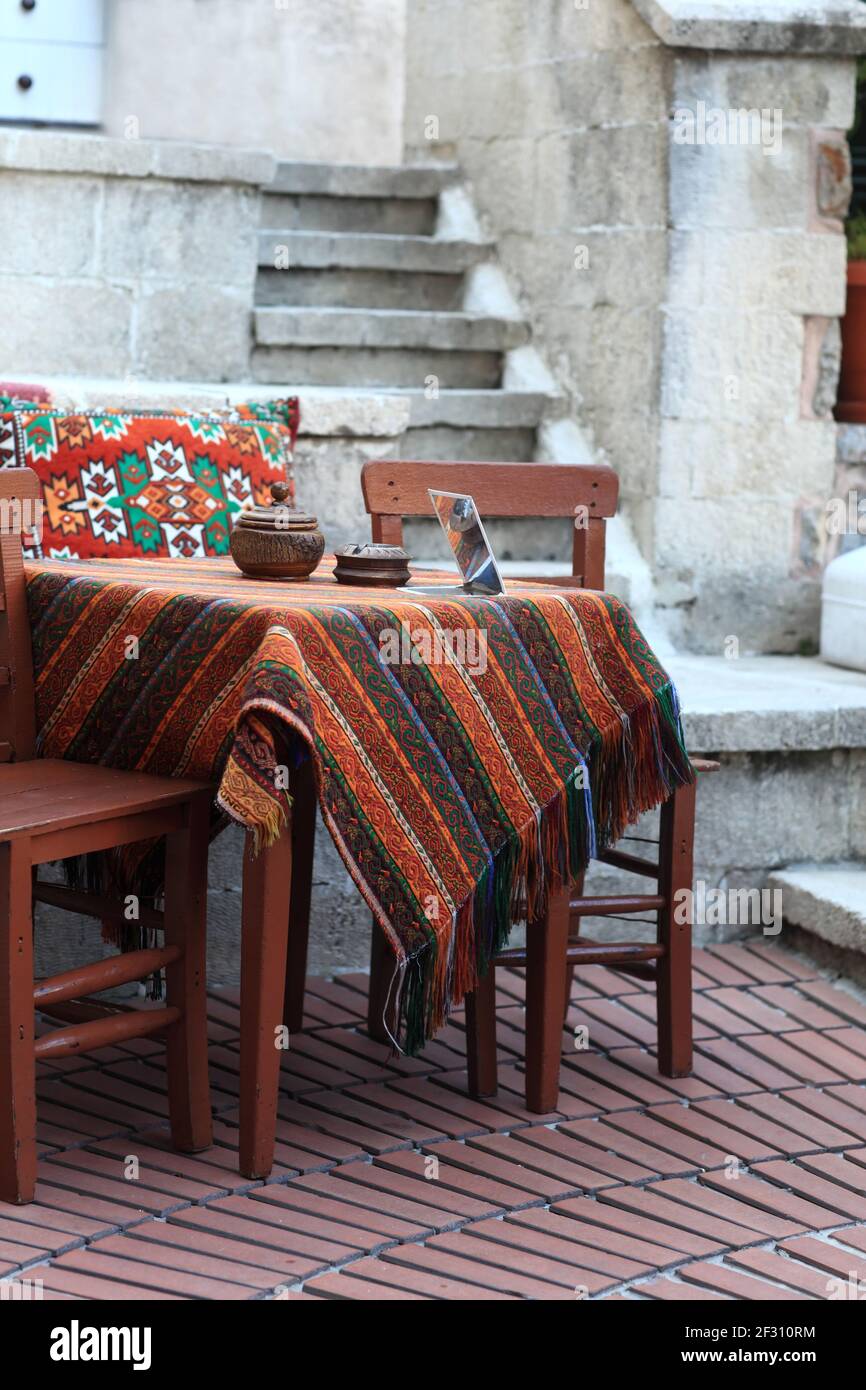 Dining table in the empty turkish cafe Stock Photo - Alamy