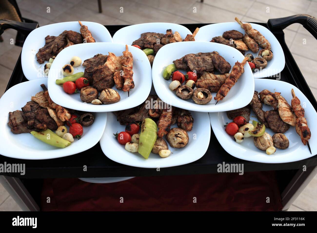 Assorted grilled meat platter in the restaurant Stock Photo - Alamy