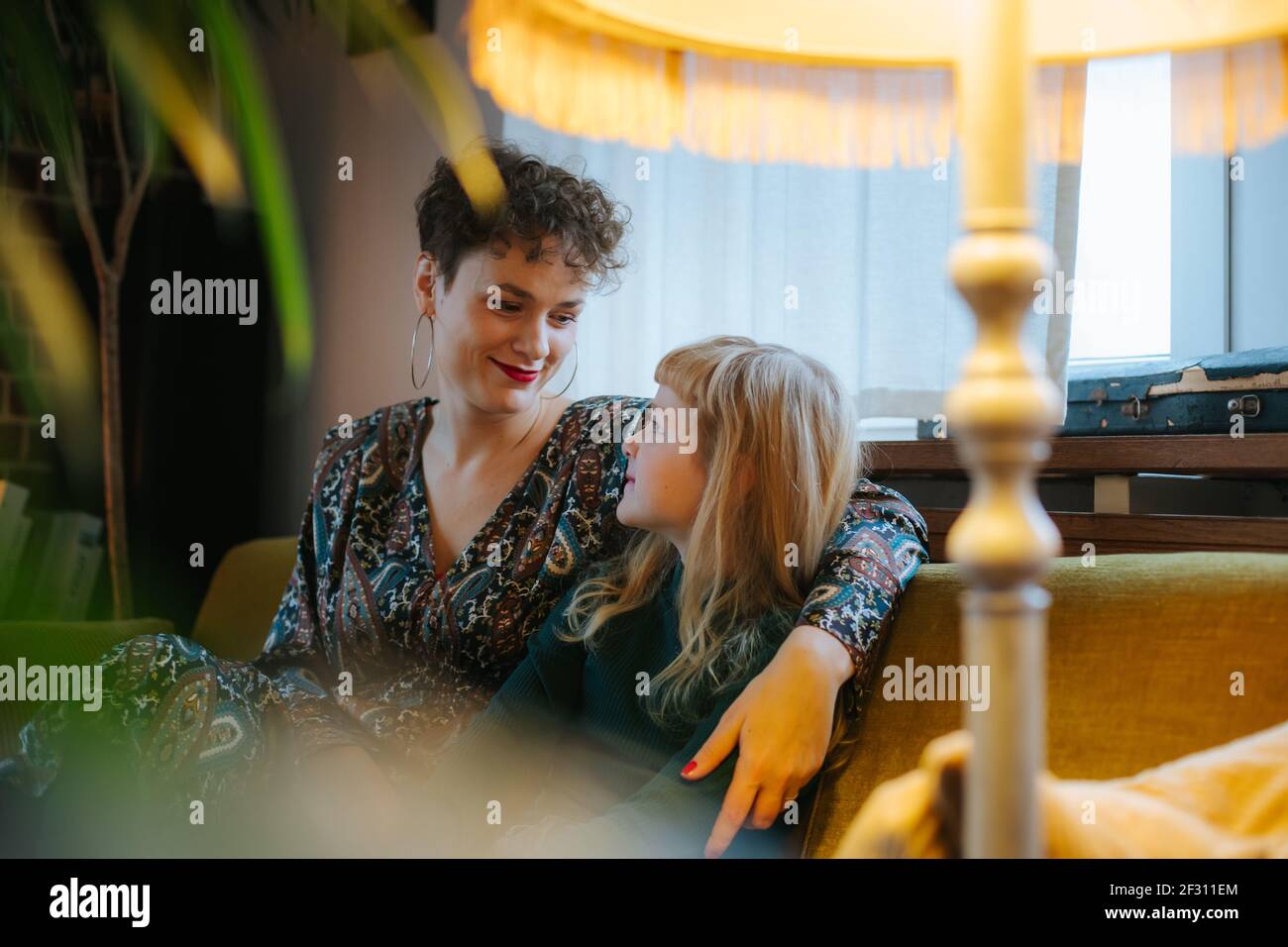 mother and her daughter are looking at each other Stock Photo - Alamy