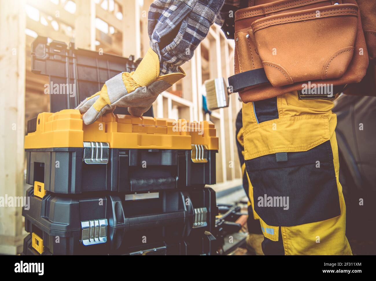Professional Construction Contractor Worker and His Tools Boxes ...