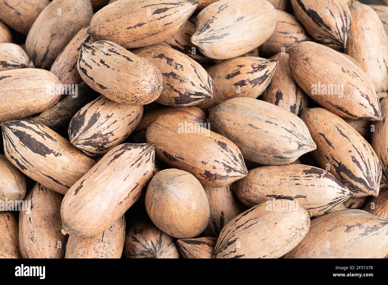 Pecan nuts in shells hi-res stock photography and images - Alamy